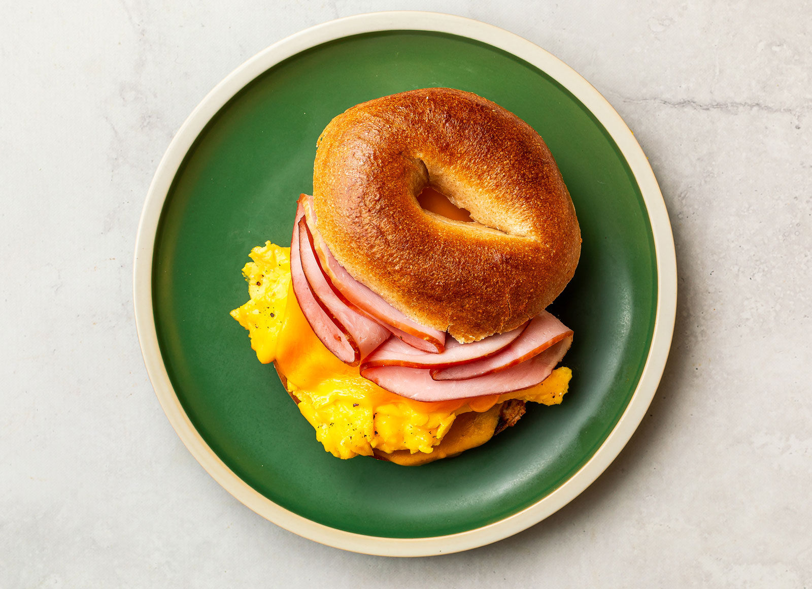 Deli-Style Ham + Cheesy Eggs on a Bagel | Hungryroot