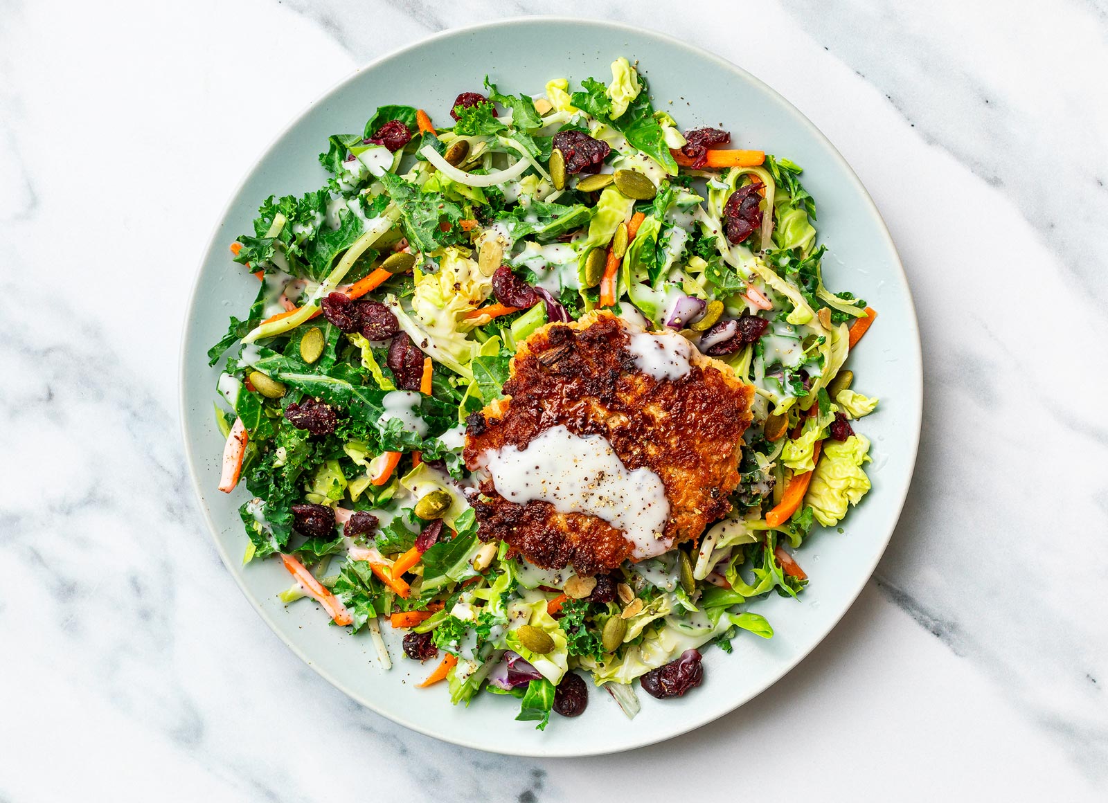 Sweet Kale Salad with Plant-Based Crab Cakes | Hungryroot