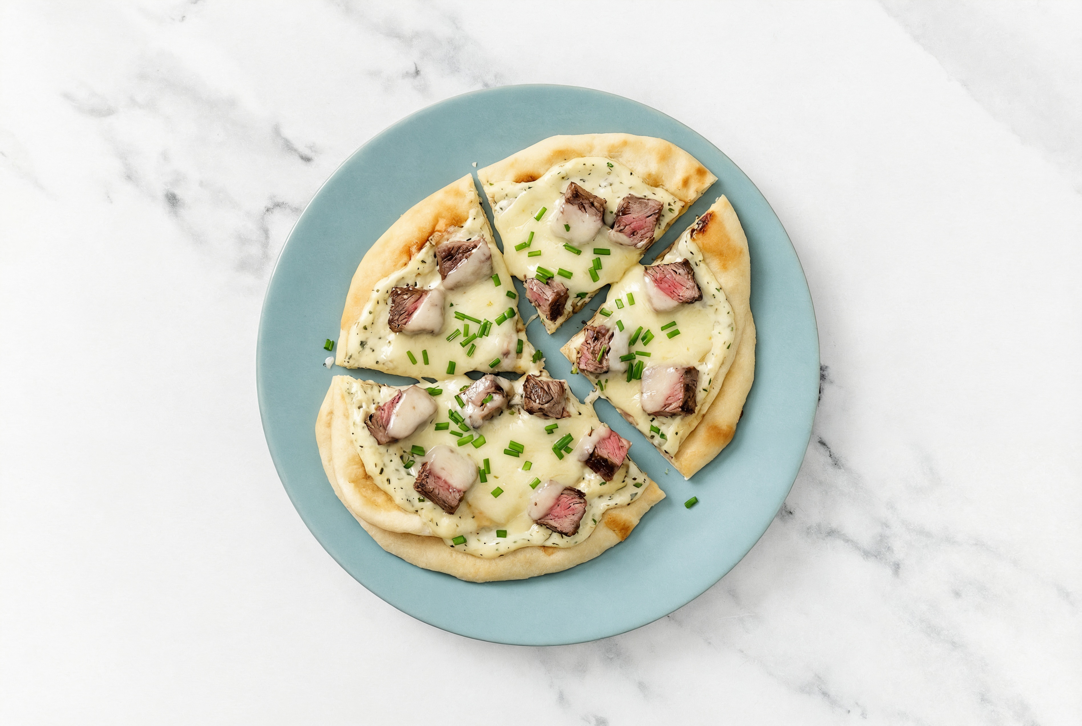 White Herb Wagyu Ribeye Naan Pizza with Mild Havarti + Fresh Chives ...